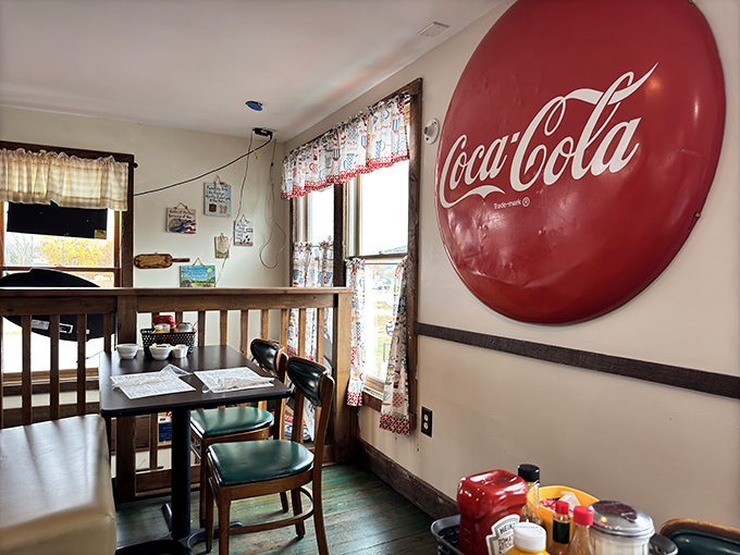 That vintage Coca-Cola button sign isn't just decoration&mdash;it's a time machine to when diners were the heart of American social life.