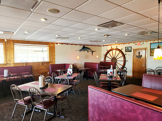 Nautical charm meets cozy comfort in Meding's dining room. That ship's wheel isn't just decoration&mdash;it's steering you toward deliciousness.