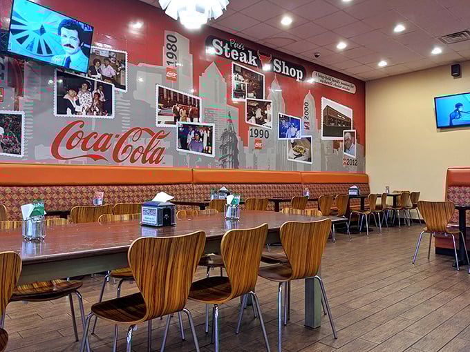 Inside, the Philadelphia skyline mural and Coca-Cola memorabilia create the perfect backdrop for cheesesteak contemplation. Comfort food deserves a comfortable setting.