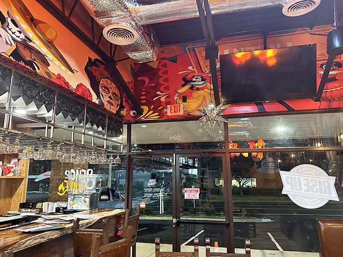 Sugar skulls watch over diners while colorful murals transport you straight to Mexico City. The decor doesn't whisper "fiesta"&mdash;it announces it.