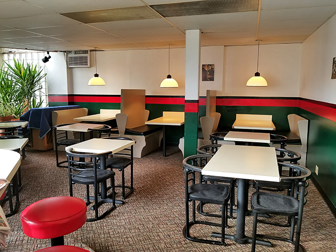 No-frills dining at its finest&mdash;where the d&eacute;cor whispers "focus on your food" and the red and green stripes remind you that Italy's flavors await.