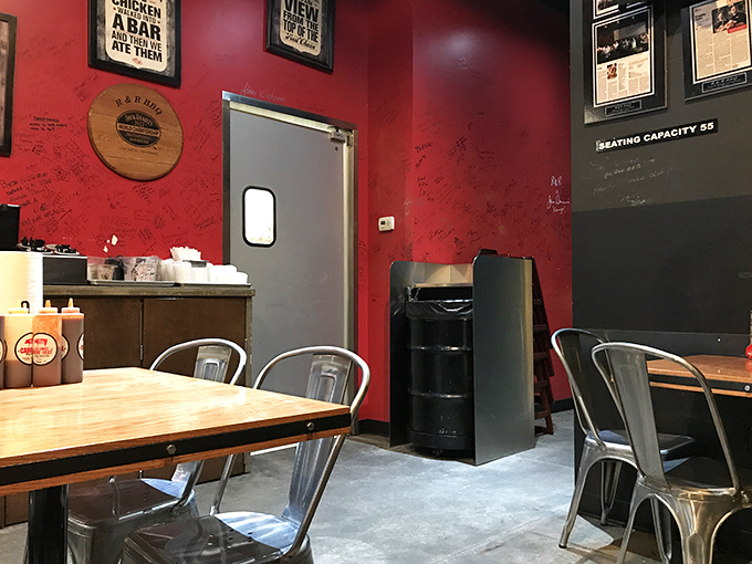 Red walls covered in signatures tell stories of satisfied pilgrims who came for brisket and found religion in smoke and fire.