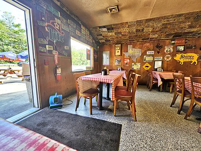 License plates on the ceiling, checkered tablecloths below&mdash;this is BBQ's natural habitat, where memories are made between bites.