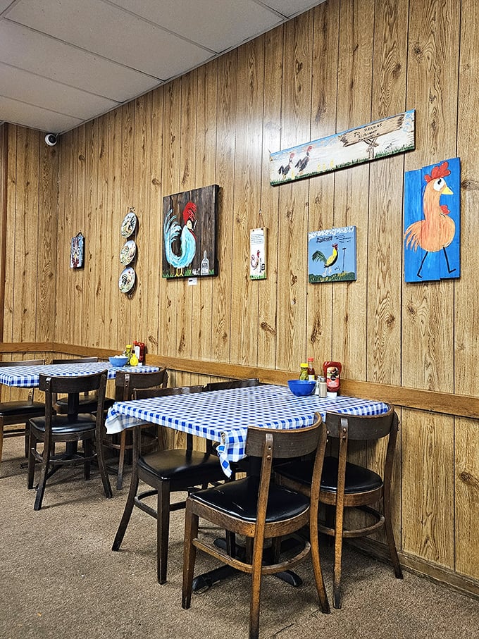 Wood-paneled walls adorned with folk art chickens create the perfect backdrop for Southern comfort food conversations.
