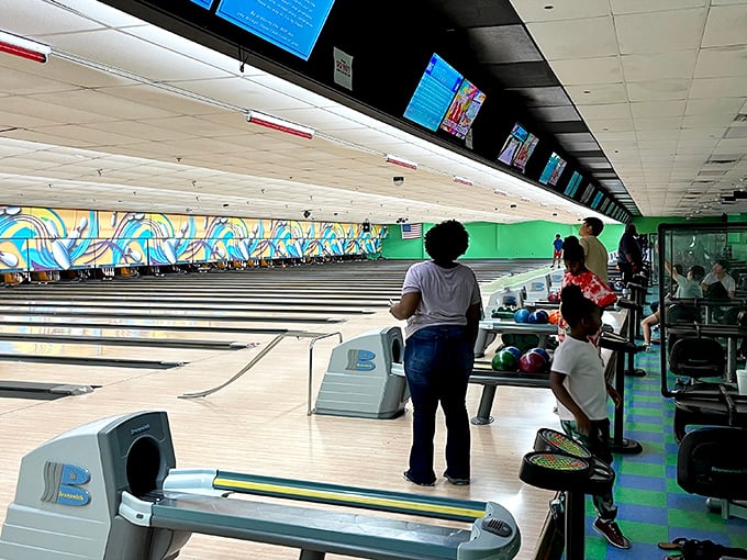 Polished lanes stretch into the distance, where the satisfying crash of pins provides the soundtrack to countless family memories in the making.