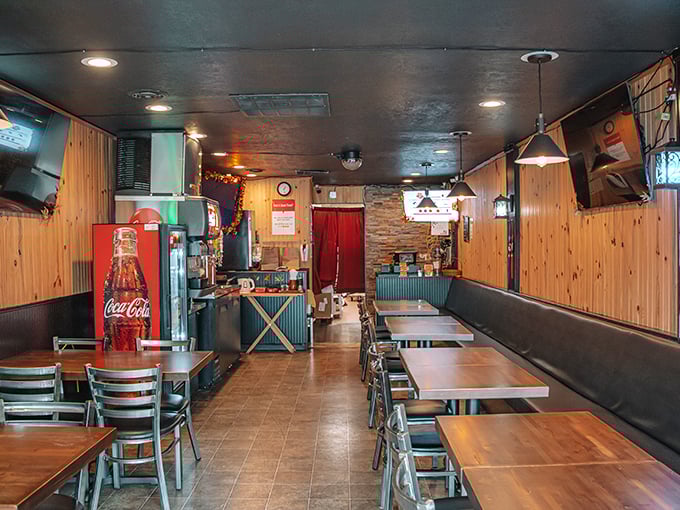 Wood-paneled walls and simple furnishings say, "We spent our money on the chicken, not the decor." Smart priorities.