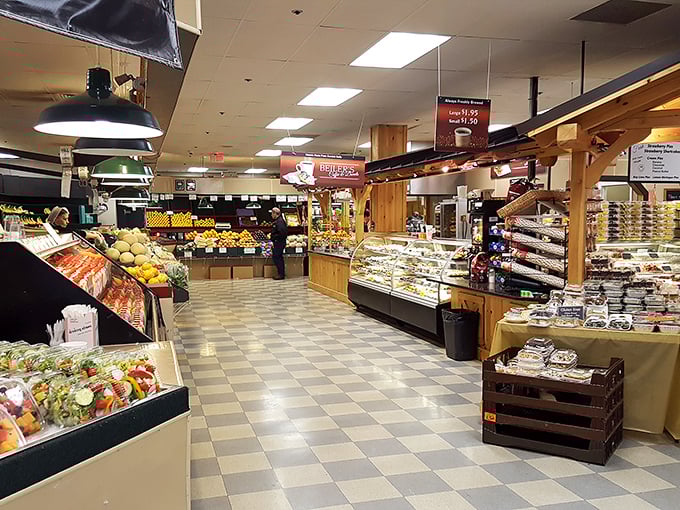 A food lover's treasure map unfolds inside, where the checkered floor leads to islands of handcrafted delights that no GPS could ever properly navigate.