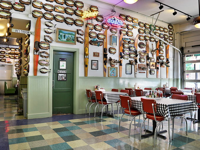 Fish trophies line the walls like a maritime hall of fame. The Billy Bass Adoption Center might be the most charming recycling program in Arkansas.