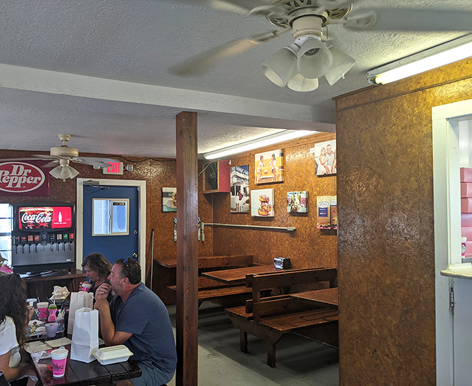 Simple wooden benches and paneled walls tell you this place prioritizes substance over style. The best restaurants always do.