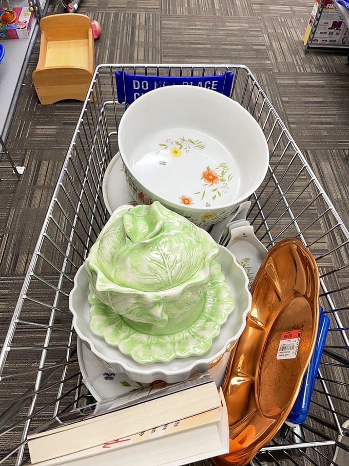 One shopper's castoff becomes another's centerpiece. This cart of vintage dishware tells stories of family dinners from decades past, waiting for new memories to be made.