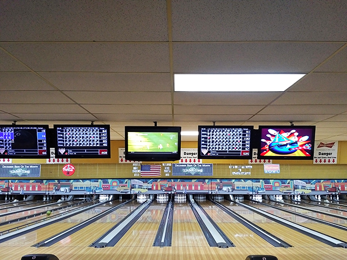 Polished lanes stretching toward infinity, where digital screens meet analog dreams and every frame tells a story.