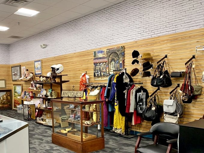 Vintage fashion meets curated collectibles in this beautifully arranged corner where accessories, clothing, and display cases create a boutique-like atmosphere.
