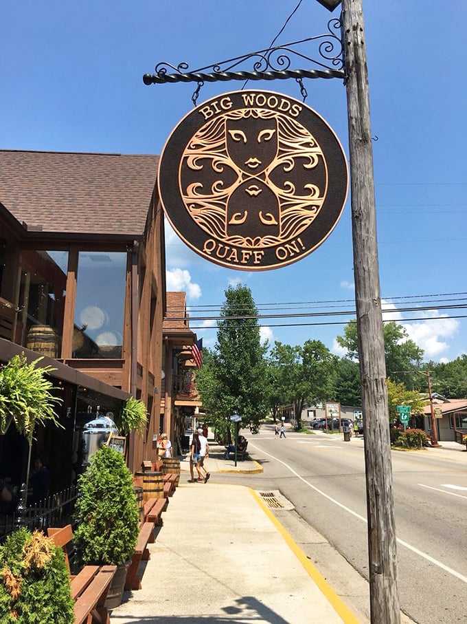 The Big Woods sign swinging gently above the sidewalk isn't just advertising &ndash; it's a promise of good times ahead. "Quaff On!" indeed.