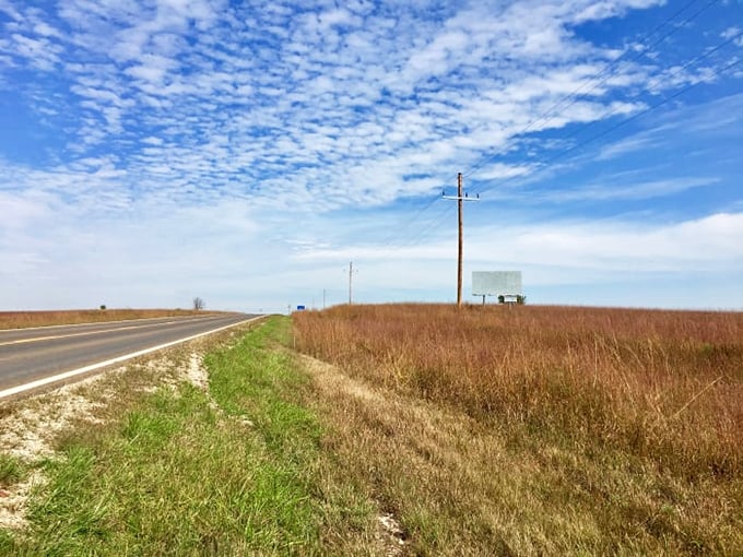 Nature's own cathedral ceiling: those cloud formations create a textured canopy above the endless Flint Hills prairie.