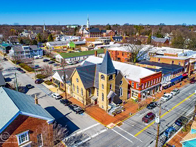 From this bird's-eye view, Chestertown reveals itself as a perfectly preserved colonial gem, with church spires punctuating the skyline like exclamation points on history's page.