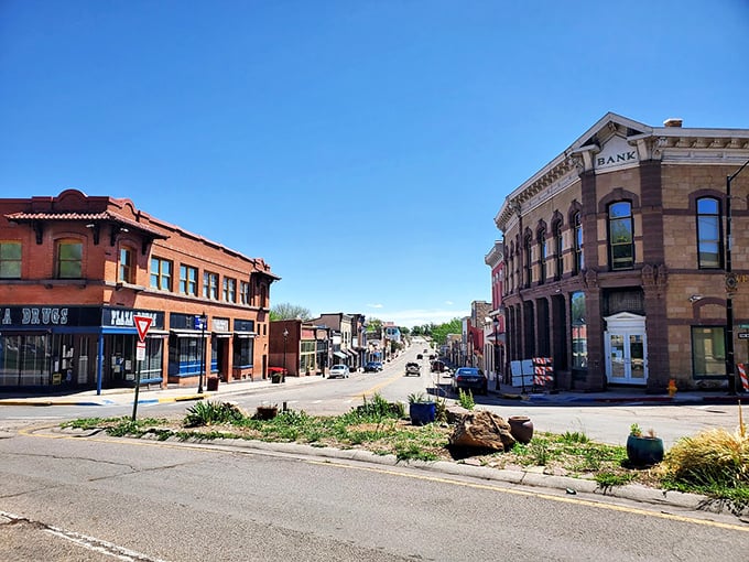 The historic district showcases a perfect marriage of brick, stone, and adobe under that vast southwestern sky. Main Street, America with a distinctive New Mexican accent.
