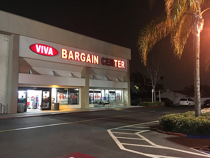 Night or day, the Viva Bargain sign beckons to savvy shoppers like a neon lighthouse guiding ships to the harbor of incredible deals.