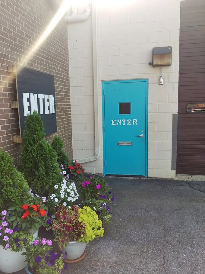 That turquoise door isn't just an entrance&mdash;it's a portal to a dimension where measuring tape is currency and perfect buttons are worth their weight in gold.