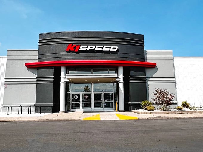 Red accents and bold signage announce your arrival at adrenaline headquarters. No turning back now—the need for speed awaits.