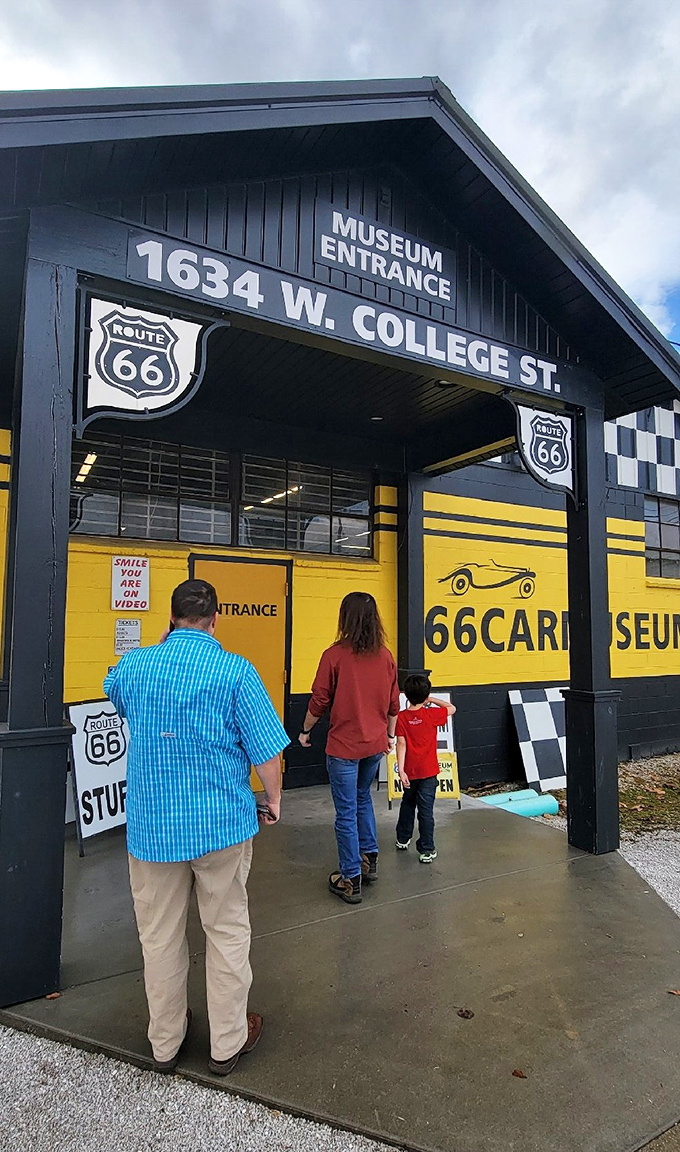 "Museum Entrance" never looked so inviting. The Route 66 shield promises a journey through America's automotive love affair just beyond these doors.