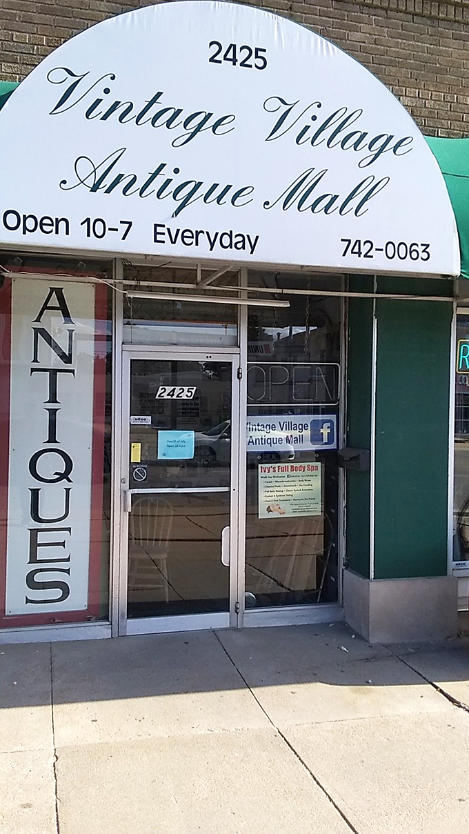 The iconic semi-circular sign welcomes time travelers daily from 10-7. Your nostalgia journey begins with just a push of the door.