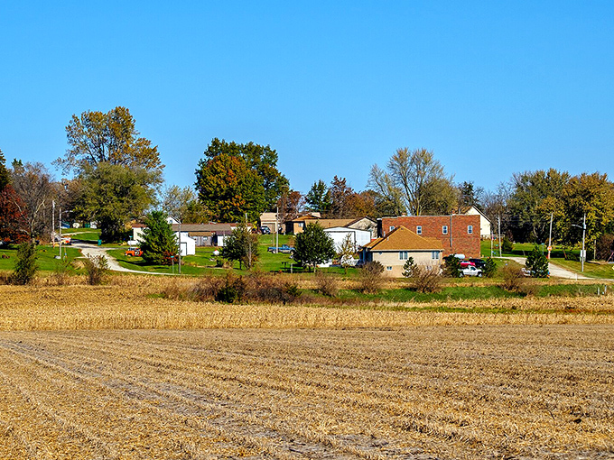Iowa's countryside cradles Bentonsport like a protective parent, golden fields stretching toward the horizon as if posing for a Grant Wood painting.