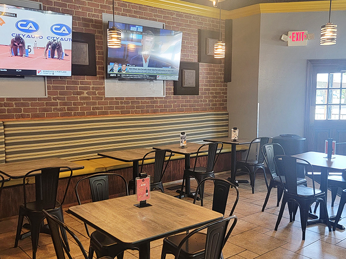 Modern industrial meets Philly comfort inside Marlow's dining room. The exposed brick and pendant lighting create the perfect backdrop for the sandwich drama about to unfold.