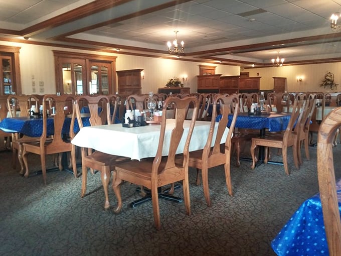 The elegant dining room combines simple beauty with functional craftsmanship, a perfect reflection of Amish values on display.