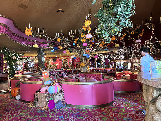 Step inside and enter a wonderland where circular pink booths meet enchanted forest decor. Alice would have extended her Wonderland stay if it looked like this.
