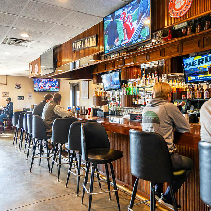 Where sports meet sustenance&mdash;Reubens' bar area invites you to settle in, making even solo dining feel like you've joined the neighborhood's most welcoming club.