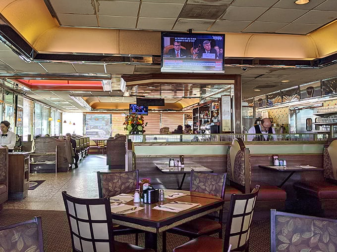 Inside, the classic diner aesthetic welcomes you with comfortable booths, warm lighting, and the pleasant hum of conversation that makes you feel instantly at home.