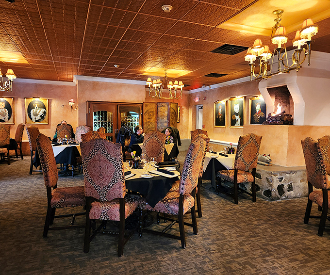 Dining under watchful feline eyes. The pressed-tin ceiling, elegant chandeliers, and leopard-print chairs create a sophisticated eccentricity that's uniquely Krazy Kat's.