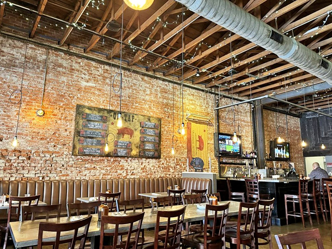 Exposed brick walls, wooden beams, and string lights create that perfect "rustic-chic" atmosphere where both your flannel-wearing nephew and martini-sipping aunt would feel at home.