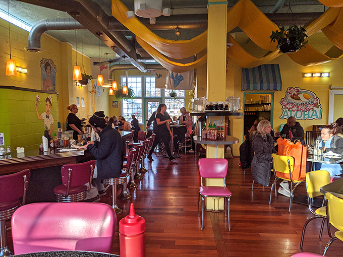 Step inside and the 1950s never looked so appetizing&mdash;yellow fabric swags, colorful chairs, and retro vibes create the perfect backdrop for breakfast euphoria.
