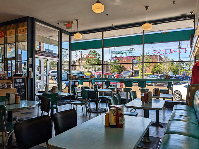 Sunlight streams through windows illuminating mint-green tables where countless Mississippi stories have unfolded over coffee and comfort food.