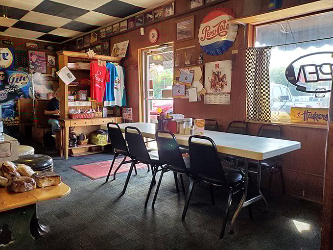 Morning regulars gather in the warm glow of Nebraska hospitality, where conversations flow as freely as the coffee.