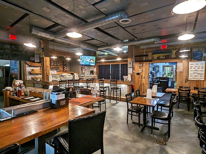 Interior: Rustic wooden tables, industrial ceiling, and nautical touches create a space that says "serious about seafood" without the pretentious maritime memorabilia overload.