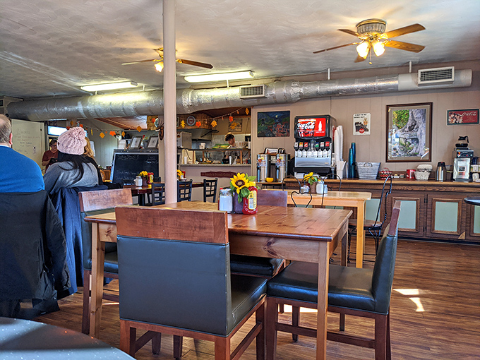 Inside, wooden tables and ceiling fans create that "everybody knows your name" atmosphere where breakfast dreams come true and coffee cups never stay empty.