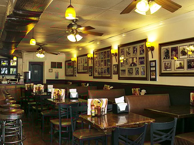 Time stands still inside these walls, where ceiling fans lazily spin above booths that have hosted everyone from civil rights leaders to hungry taxi drivers seeking culinary salvation.