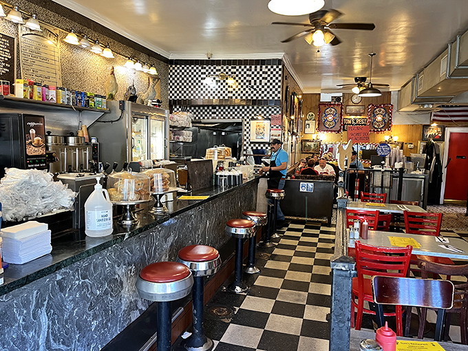 The classic black and white checkered floor and red counter stools aren't trendy by design&mdash;they're authentic by survival, a diner ballet that's been performed for decades.