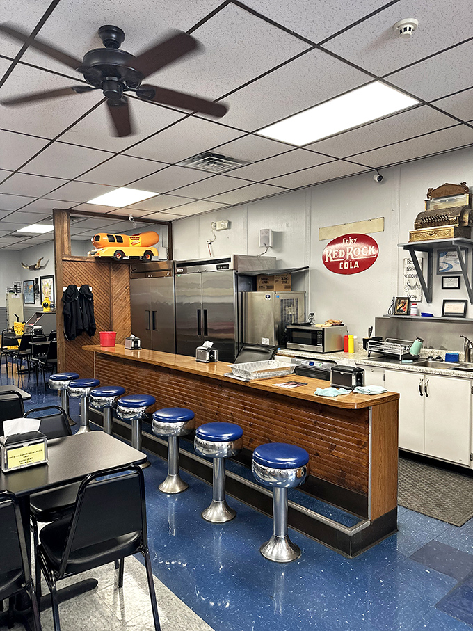 Blue vinyl stools at the counter invite you to pull up a seat and join the club of Texas Hot Dog devotees who've been perching here for generations.