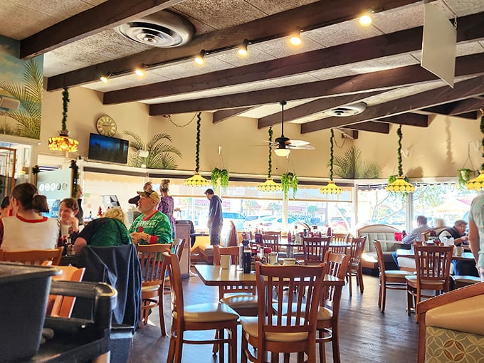 Wooden beams, hanging plants, and the gentle hum of conversation create that perfect diner atmosphere where memories are made between coffee refills.