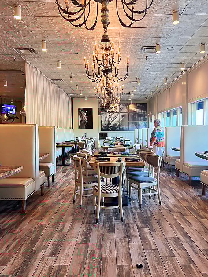 Elegant chandeliers and cream booths create that sweet spot between "special occasion" and "Tuesday night dinner." Like wearing your fancy jeans to a concert.