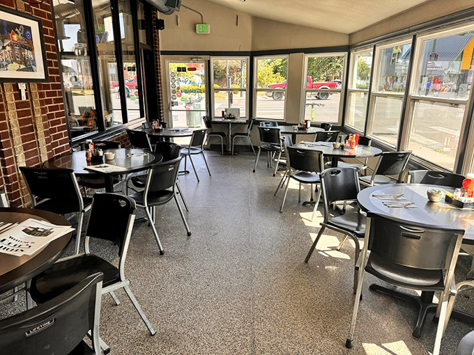 Sunlight streams through windows illuminating simple tables where countless Denver stories have unfolded over steaming coffee cups and syrup-soaked pancakes.