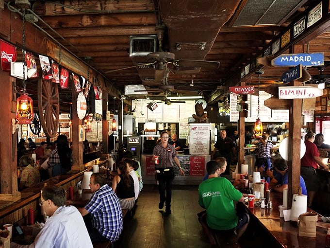 Step inside and time travels backward &ndash; wooden communal tables, license plates on walls, and directional signs pointing everywhere except away from good food.