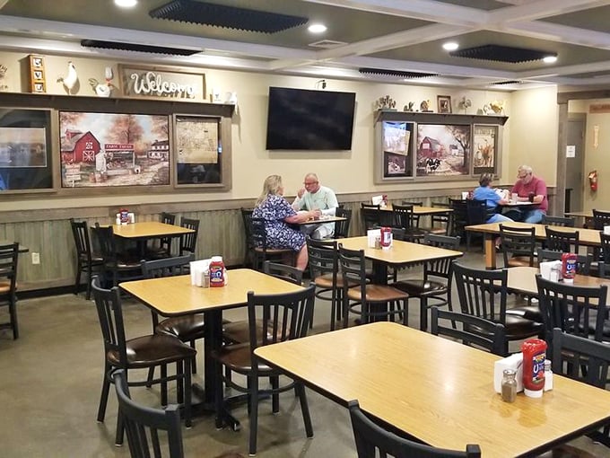 Farm-themed decor and simple wooden tables create that "grandma's dining room" vibe where comfort trumps pretension every time.