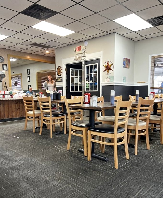 Inside, wooden chairs and simple tables create the perfect backdrop for breakfast drama where pancakes, not people, are the stars.