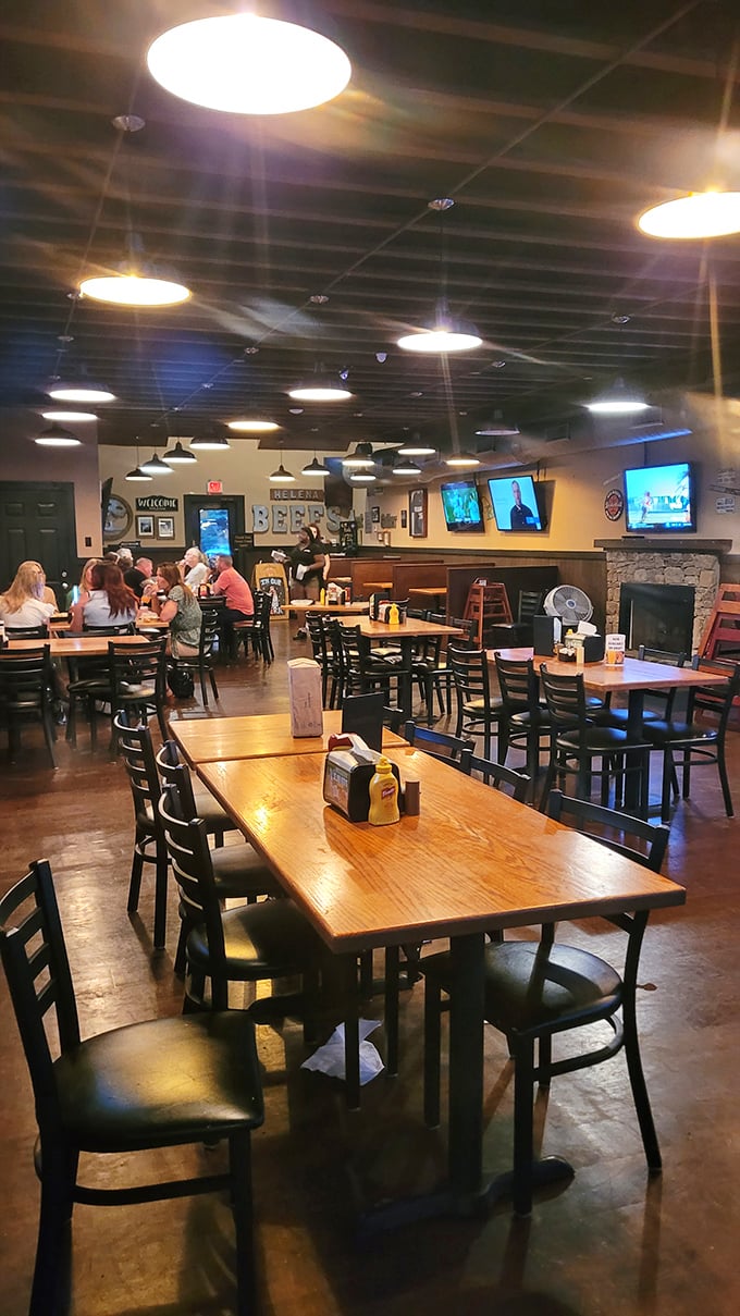 Step into a sports fan's paradise! This lively interior is where game day meets gourmet, with enough TVs to make even the most dedicated couch potato feel right at home.