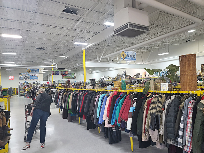 Rows upon colorful rows of clothing stretch toward the horizon, each garment waiting patiently for its second chance at fashion glory.