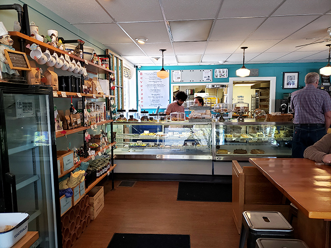 Inside, the turquoise walls and wooden accents create that perfect "third place" vibe&mdash;not home, not work, but somewhere you actually want to be.